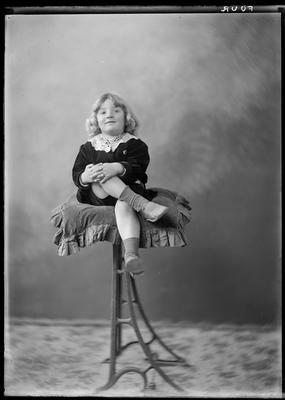 Seated child - Tairawhiti Museum