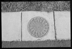 First To See the Light Footpath Plate - Tairawhiti Museum