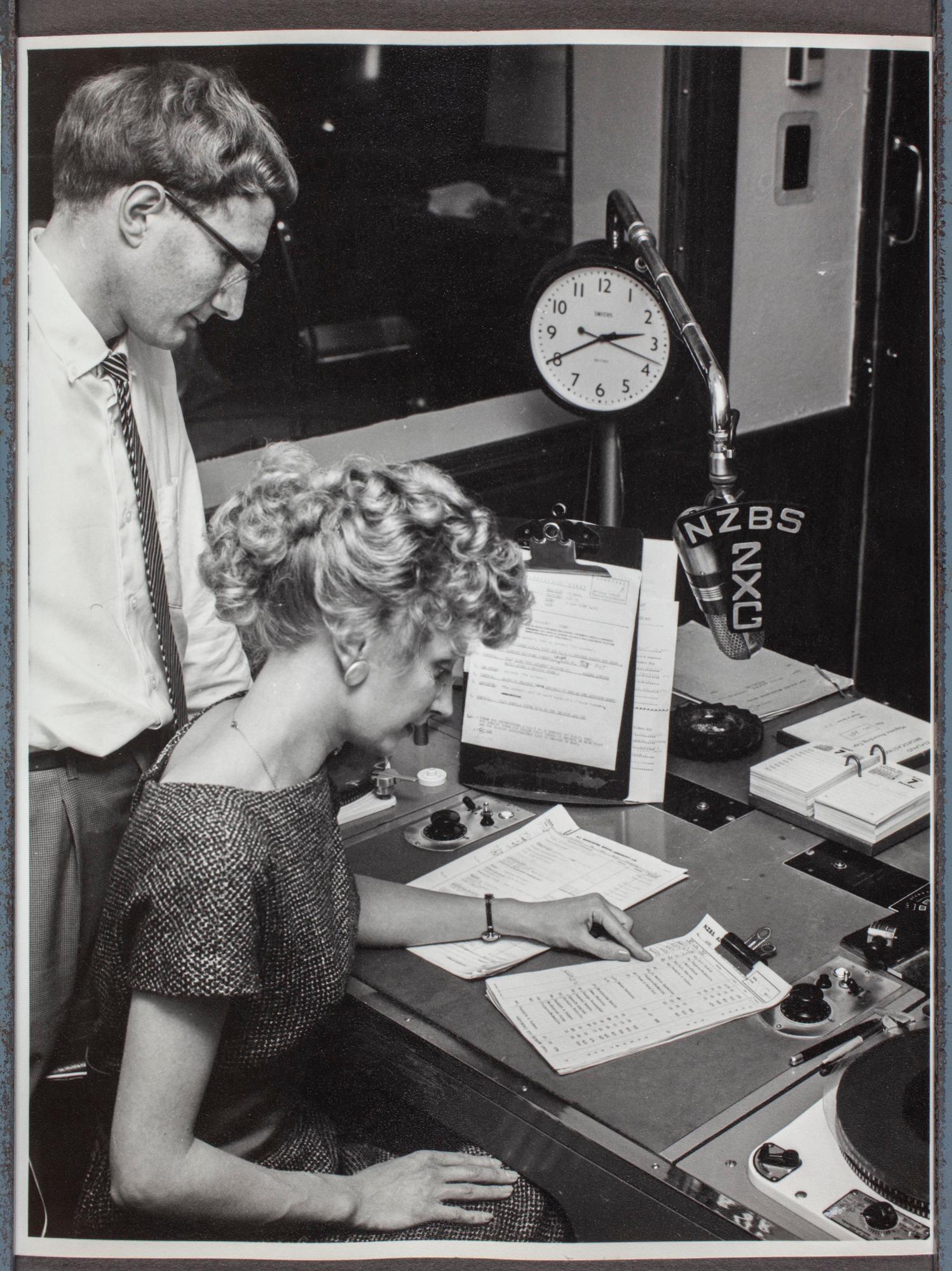 Eileen Cook and unidentified man in Radio 2ZG studio - Tairawhiti Museum