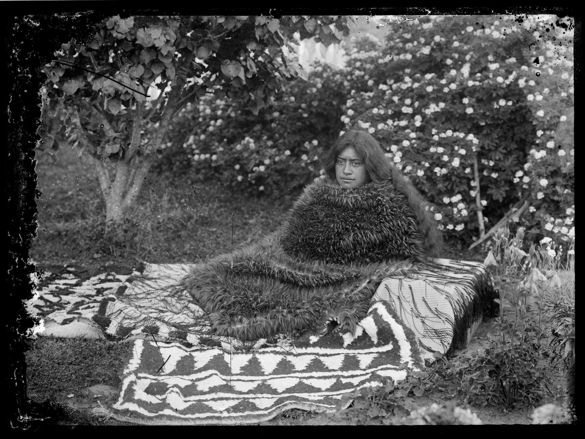 Woman in kahu kiwi - Tairawhiti Museum
