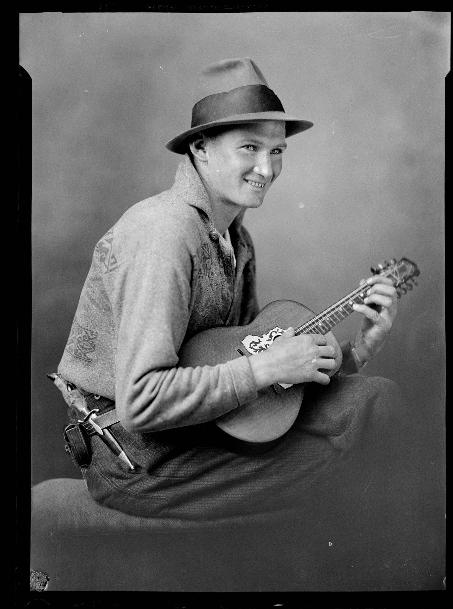 Jack Millard with mandolin - Tairawhiti Museum
